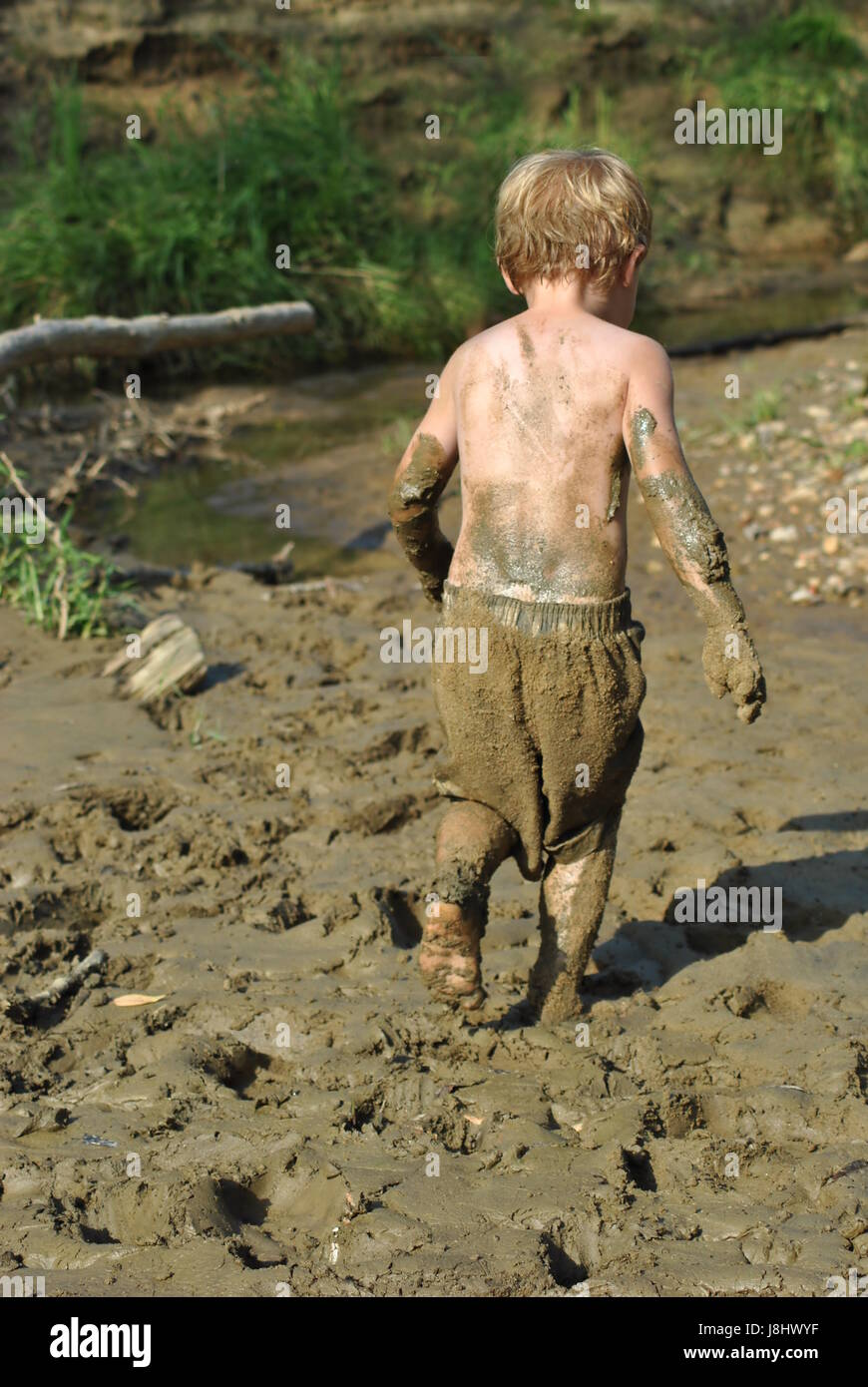 child in the mud Stock Photo - Alamy