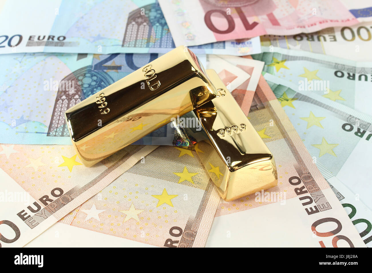 gold bars and euro Stock Photo - Alamy