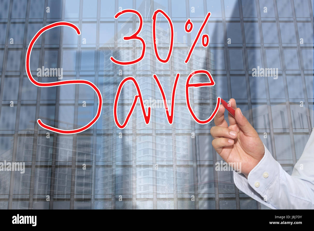 Hand of a businessman hand drawn a word of Save 30% concept of ...