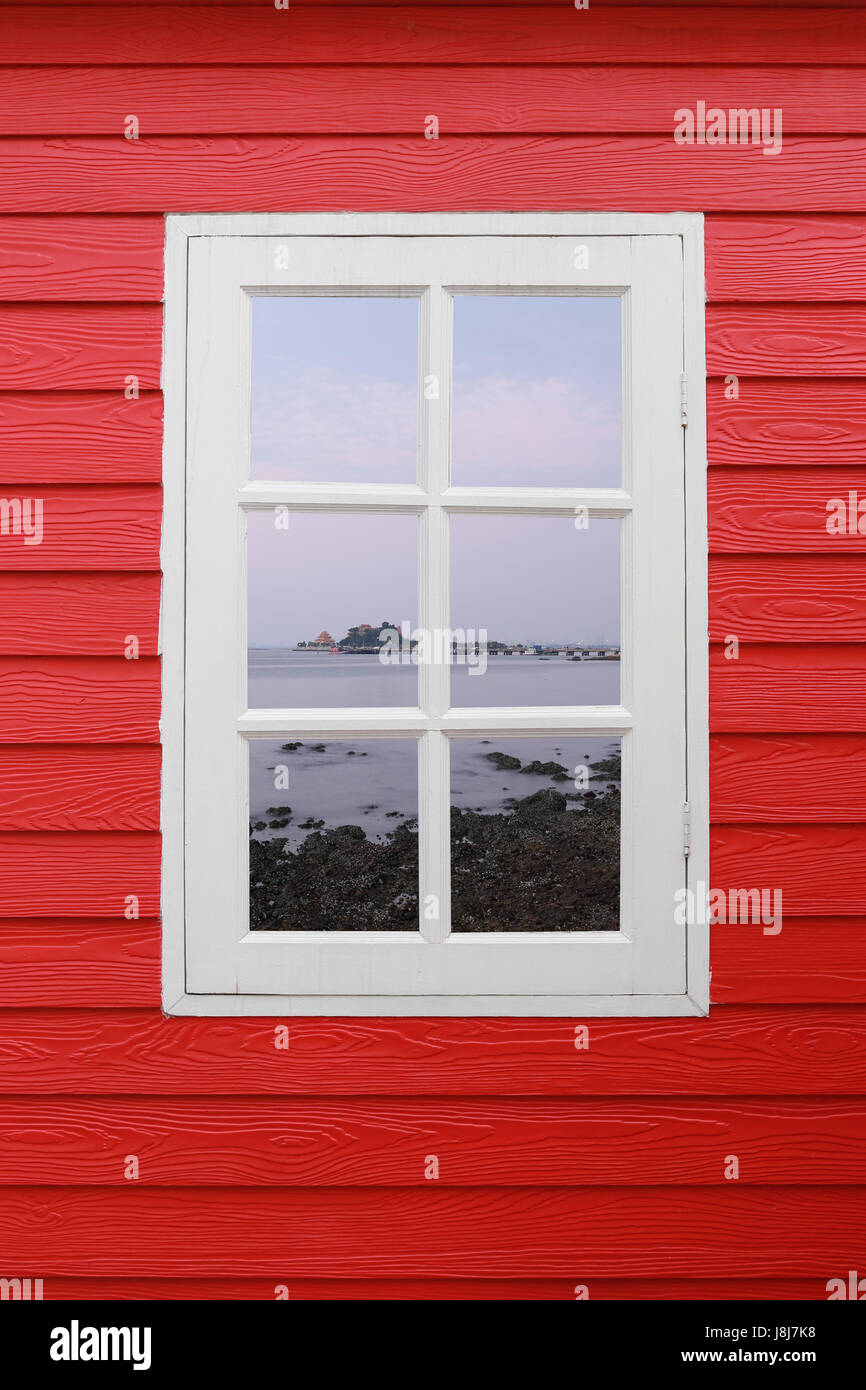 White window looking out to see view the seashore in the evening Stock ...