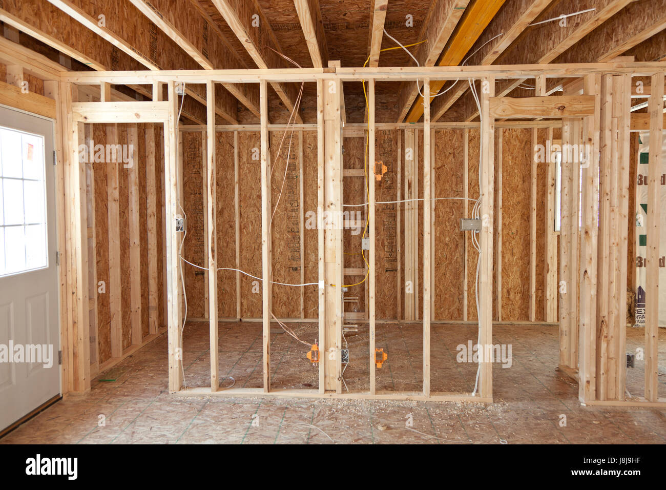Framing the walls on a new home Stock Photo - Alamy