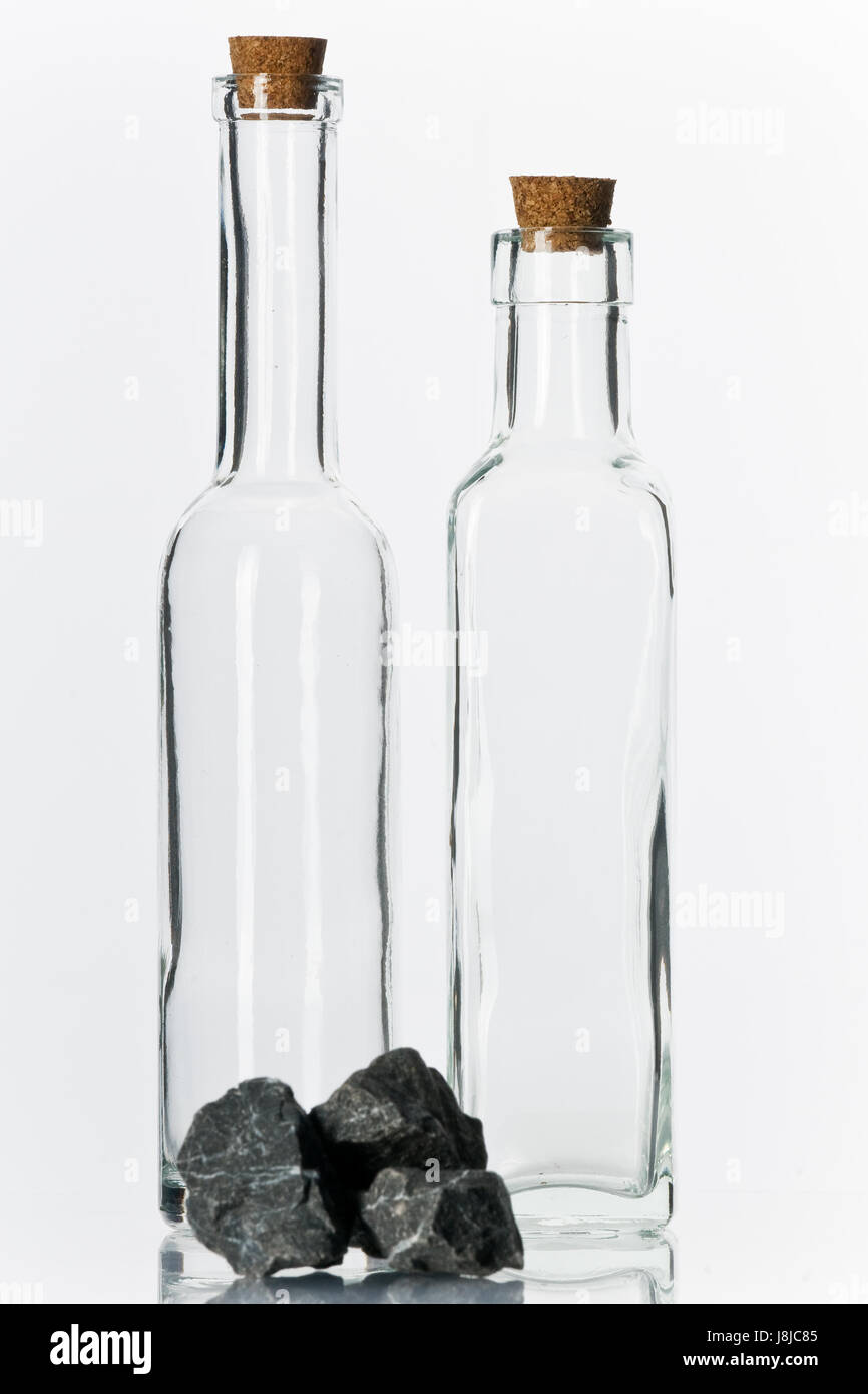 bottles with stones Stock Photo - Alamy