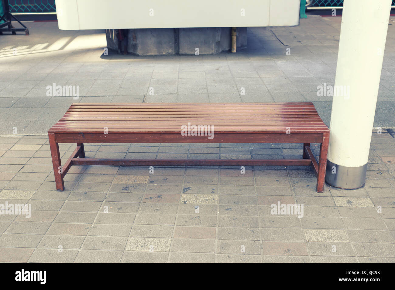 Wooden bench in bus stop hi-res stock photography and images - Alamy