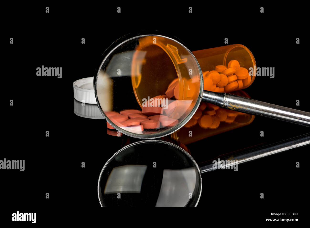 Close look at medicaiton on an orange bottle Stock Photo - Alamy