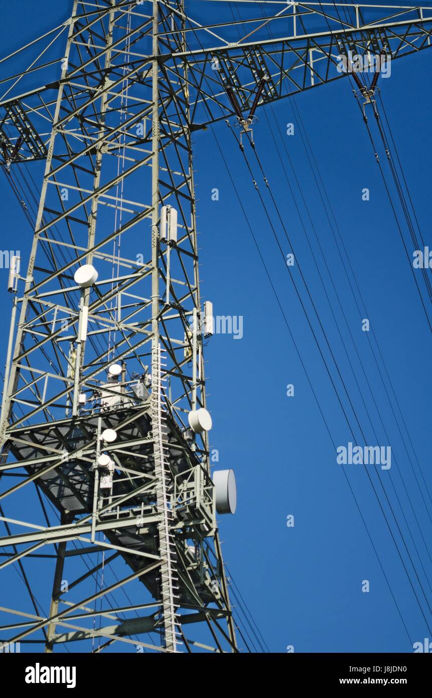 electricity and communication mast Stock Photo - Alamy