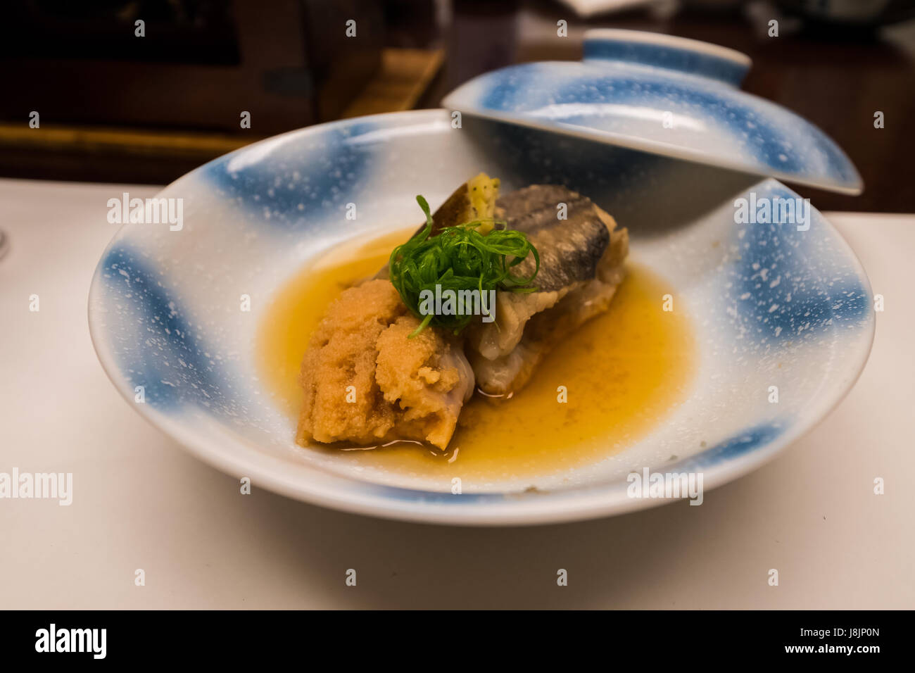 Japanese appetizer with small fish fillet and roe Stock Photo - Alamy