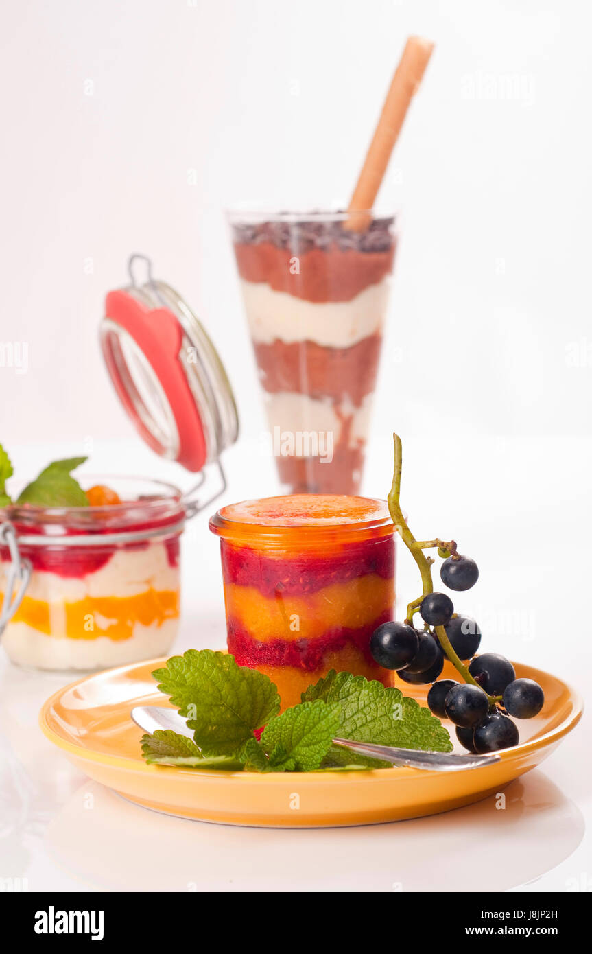 fruit mousse layered in glass with grapes / fruit mousse l Stock Photo ...