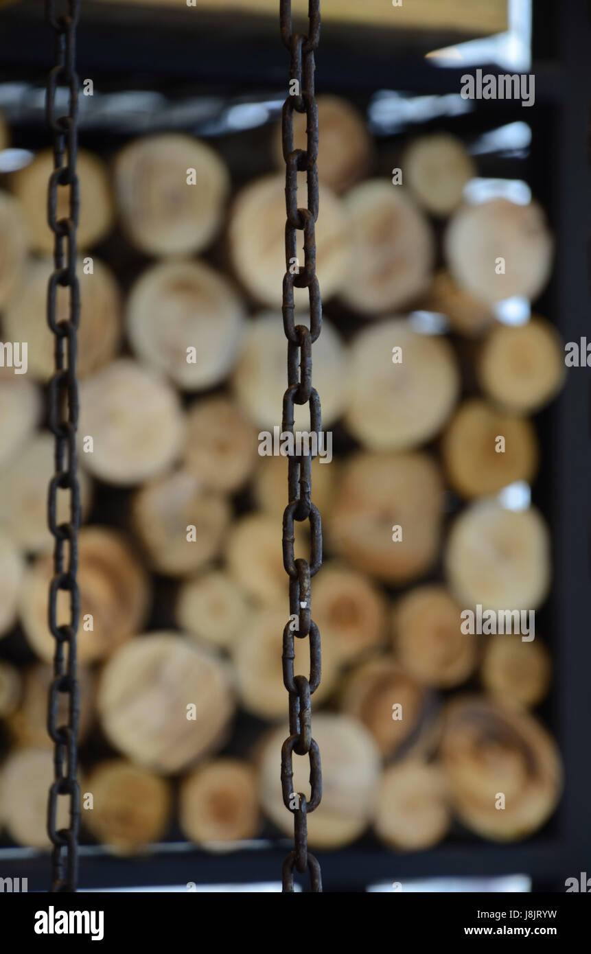 Old Chain with firewood background Stock Photo - Alamy