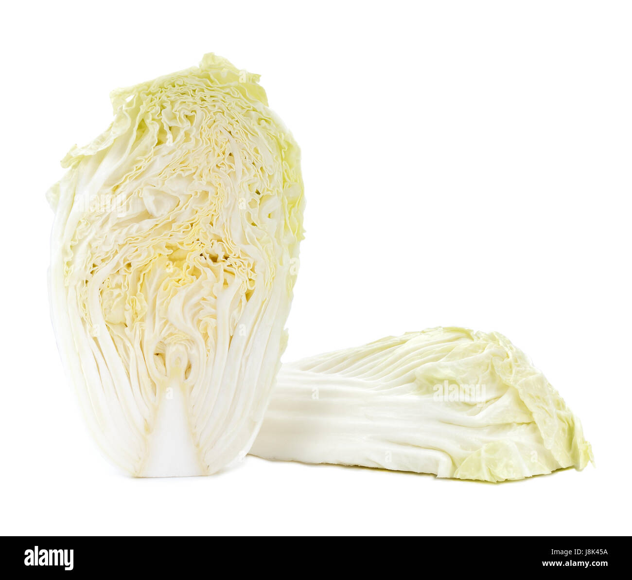 fresh napa cabbage cut in half on white background Stock Photo - Alamy