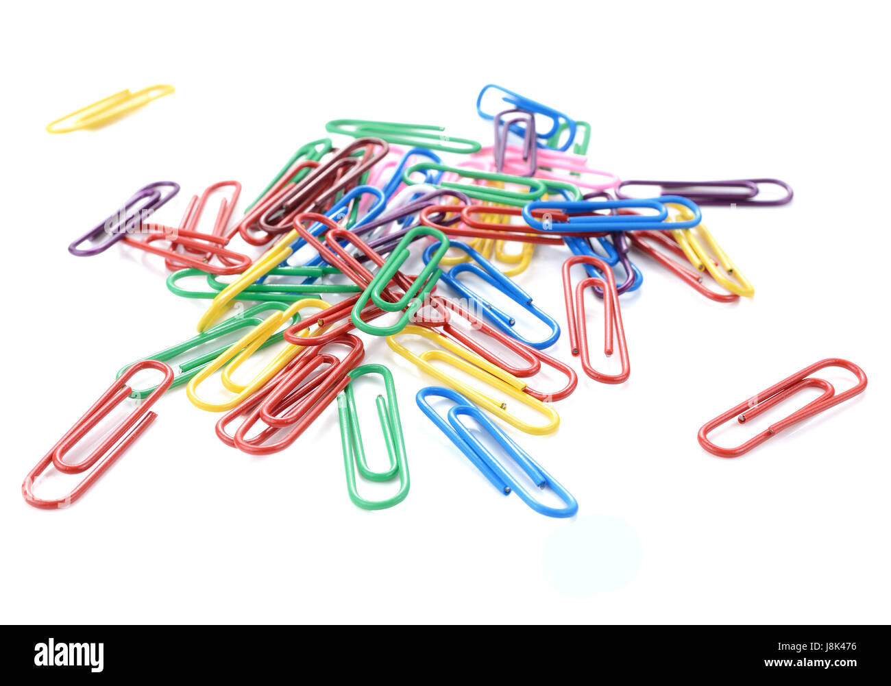 Joined colored paperclips on white background Stock Photo - Alamy