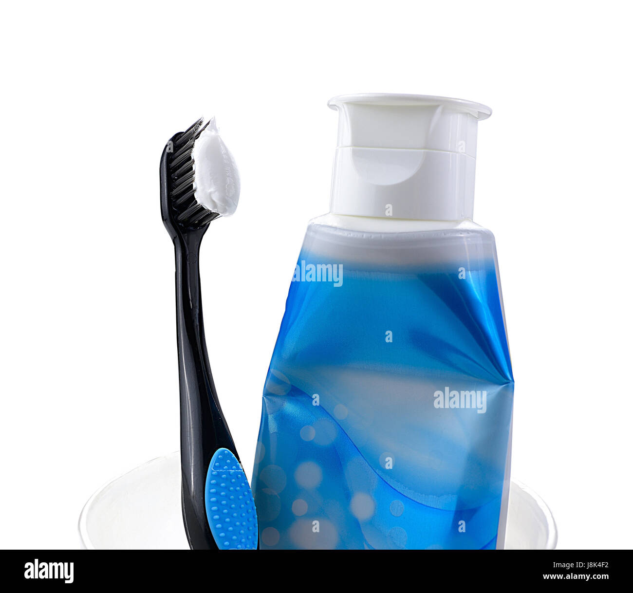 Toothpaste and toothbrush in the glass Stock Photo - Alamy