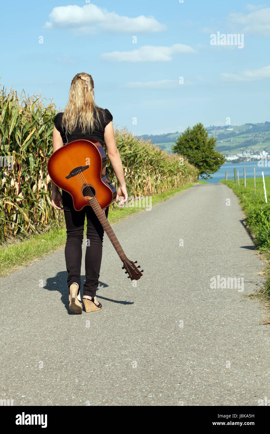 walk, go, going, walking, female, musician, day, during the day ...