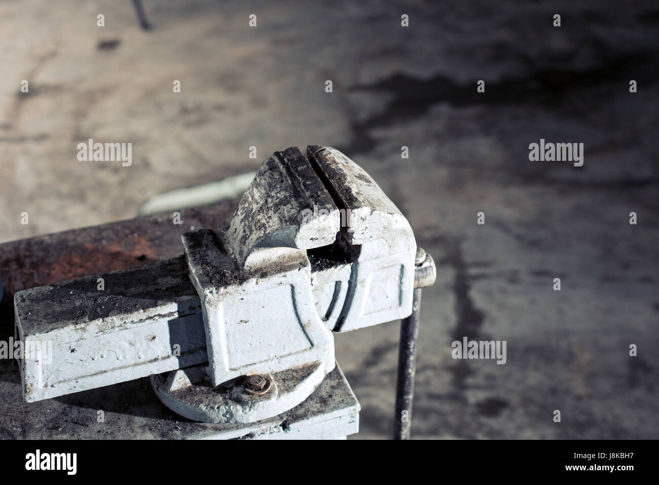 tool mechanics on the table in the garage. Articulating magic friction ...