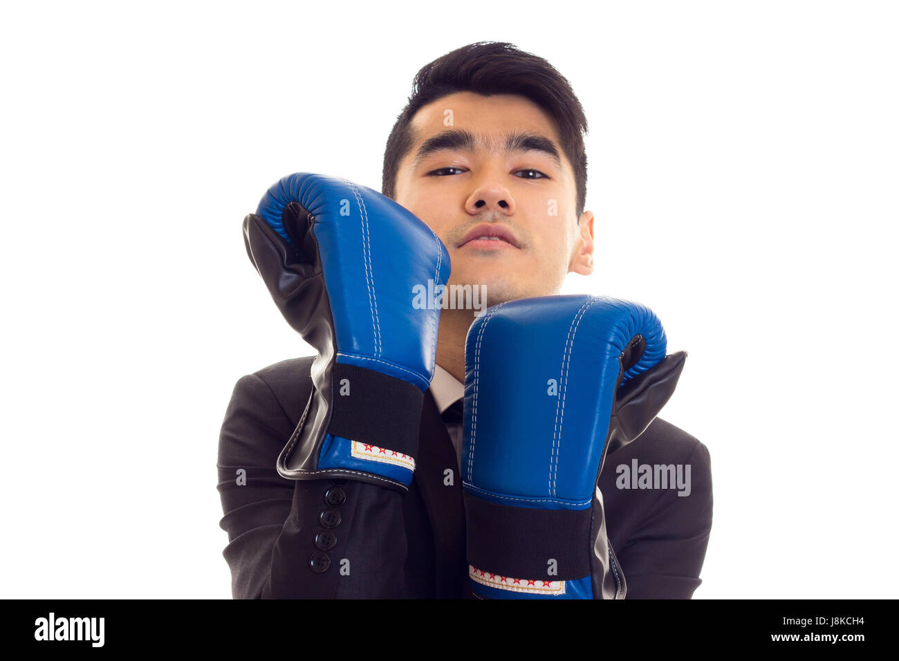 Young man in suit with boxing gloves Stock Photo - Alamy