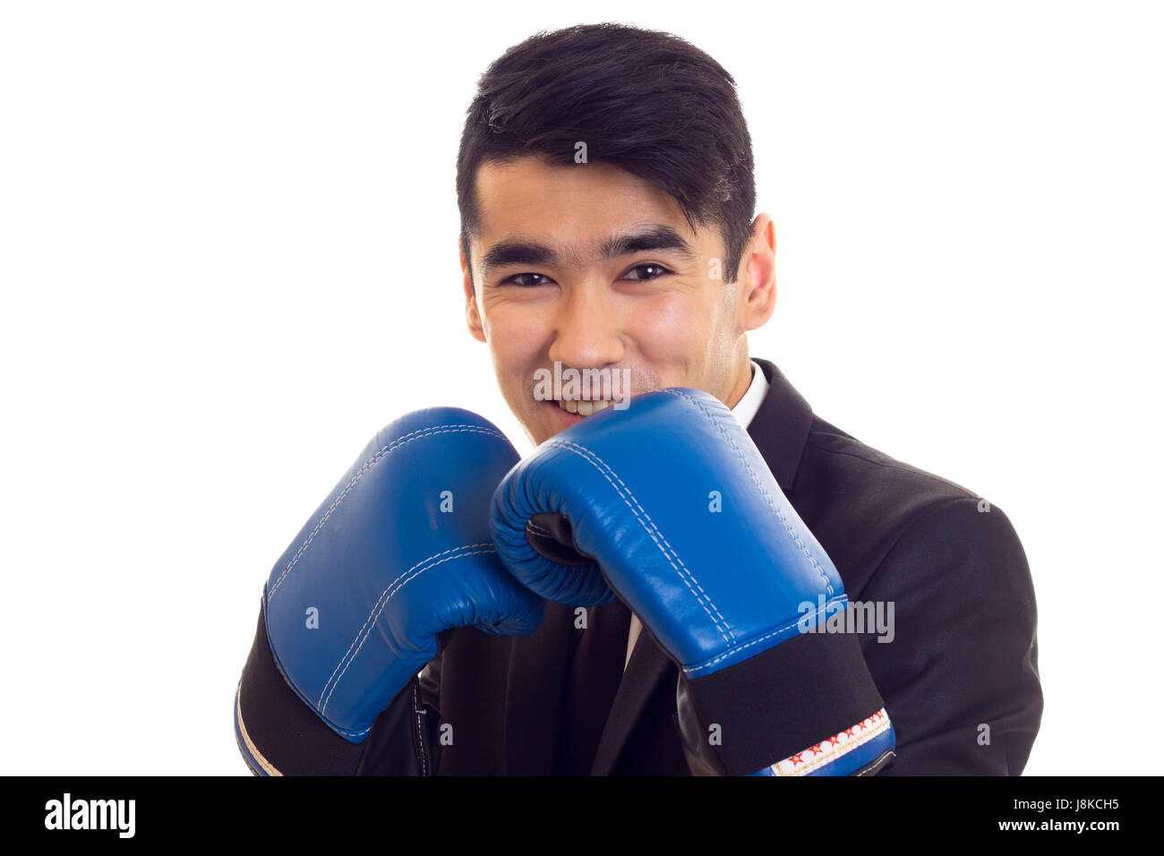 Young man in suit with boxing gloves Stock Photo - Alamy