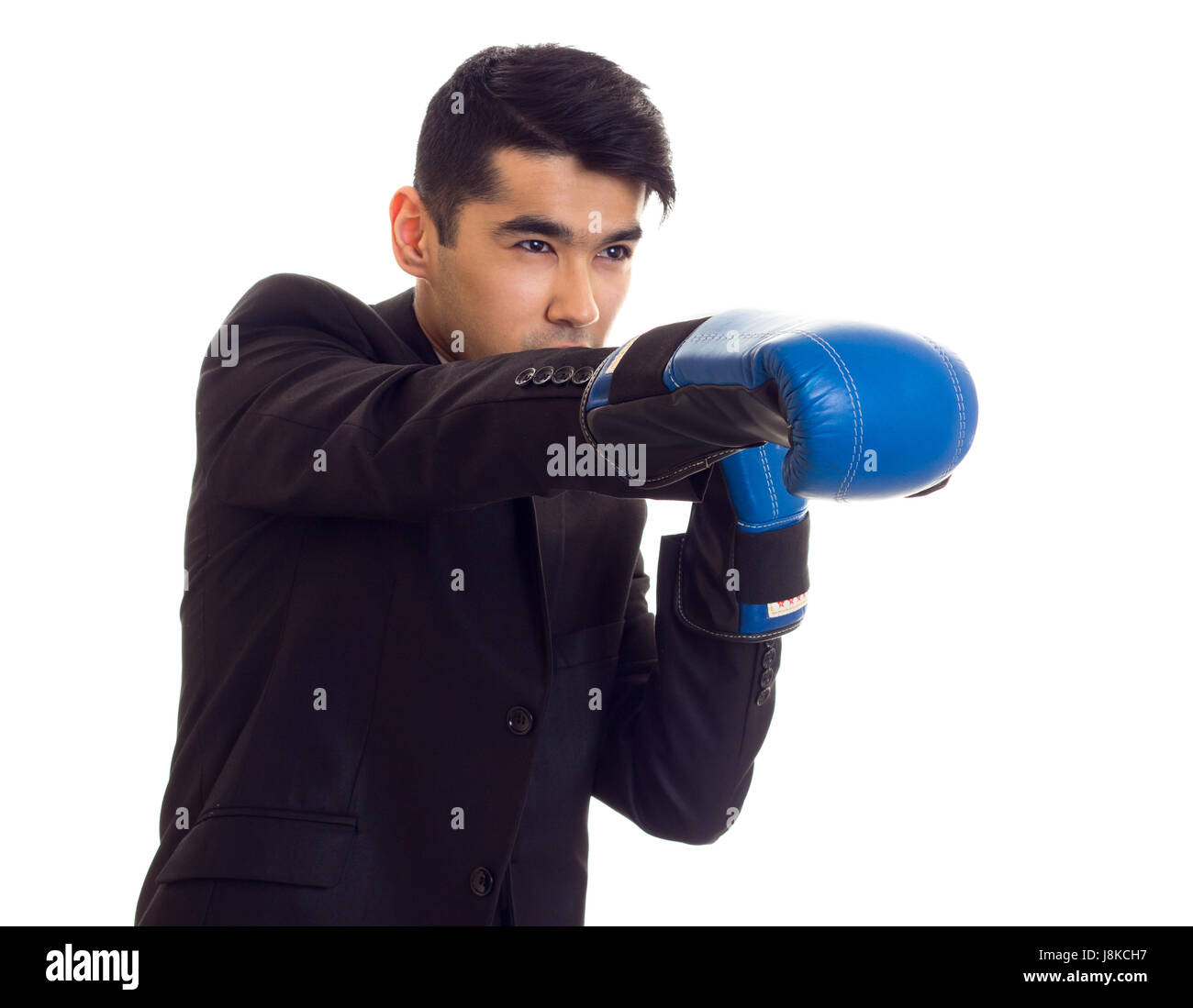 Young man in suit with boxing gloves Stock Photo - Alamy