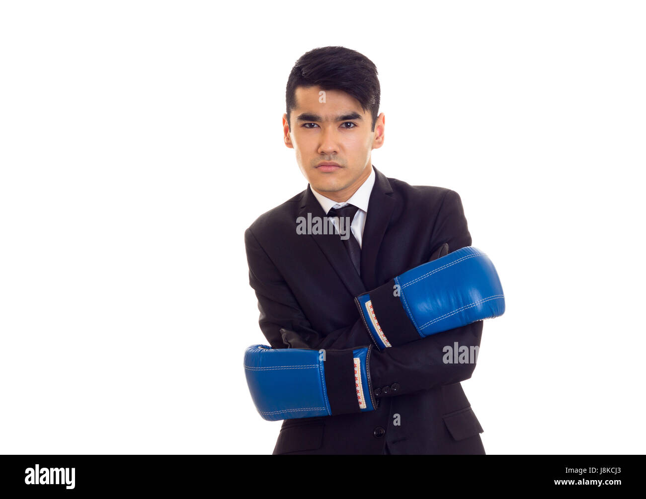 Young man in suit with boxing gloves Stock Photo - Alamy