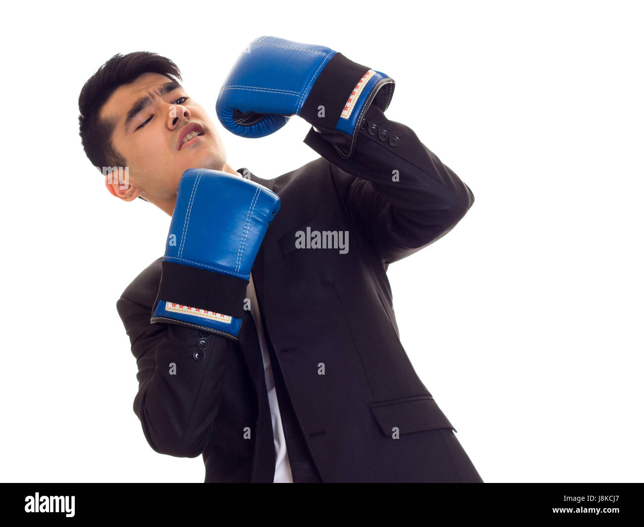 Young man in suit with boxing gloves Stock Photo - Alamy