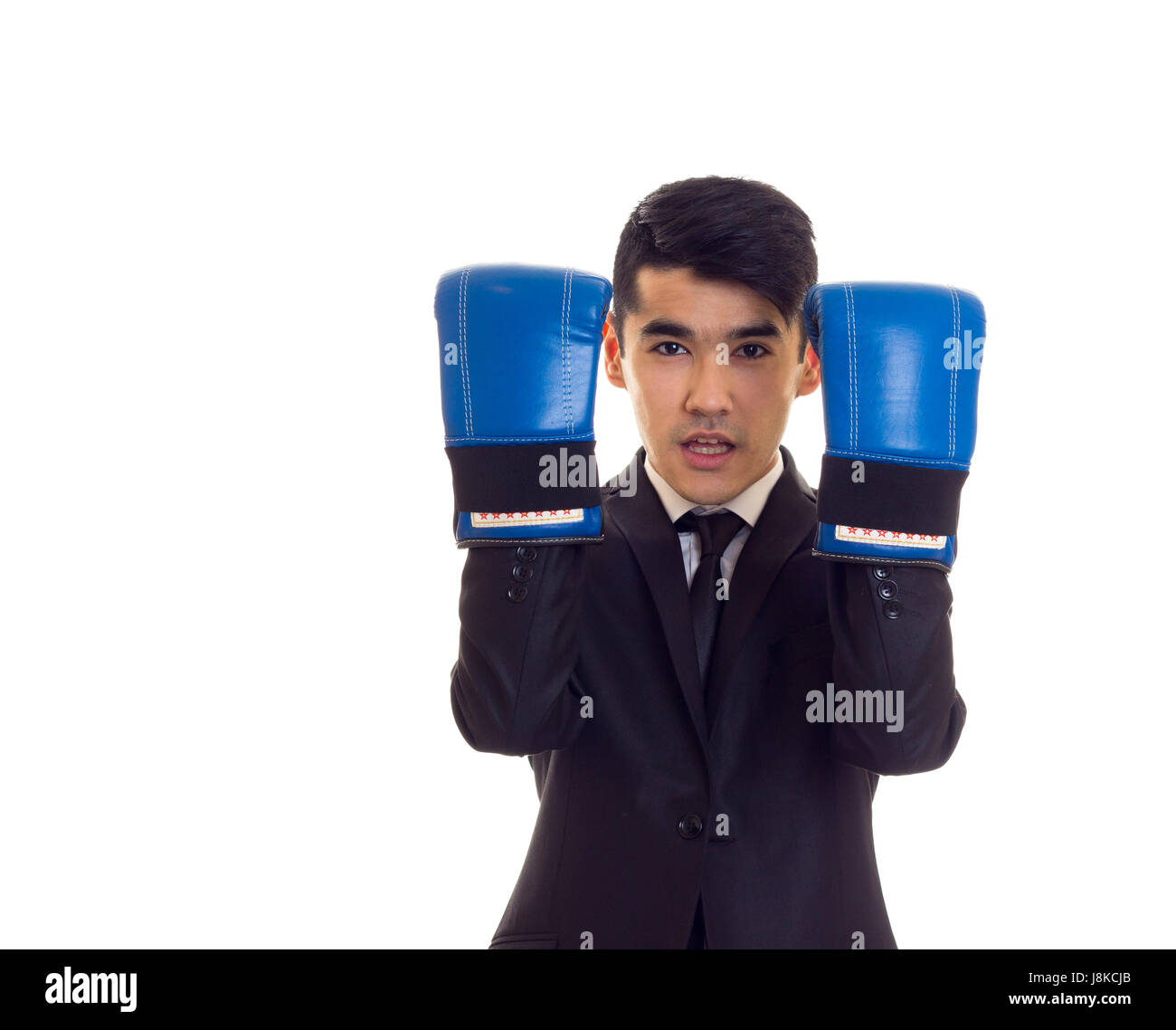 Young man in suit with boxing gloves Stock Photo - Alamy