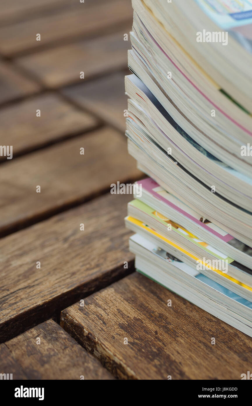 Stack of old magazines on wooden background, selective focus Stock ...
