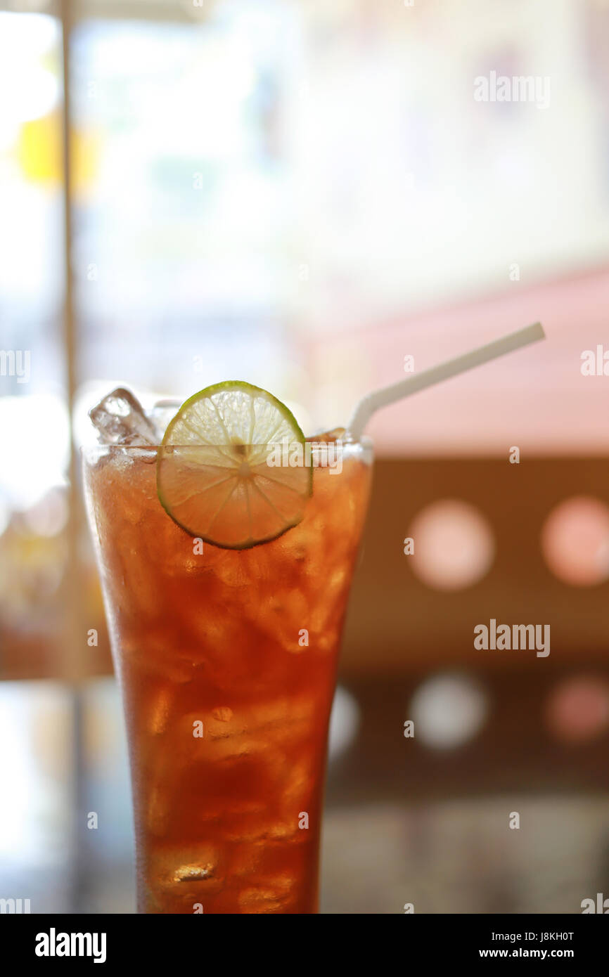 glass of iced lemon tea on foods table in a cafe Stock Photo - Alamy