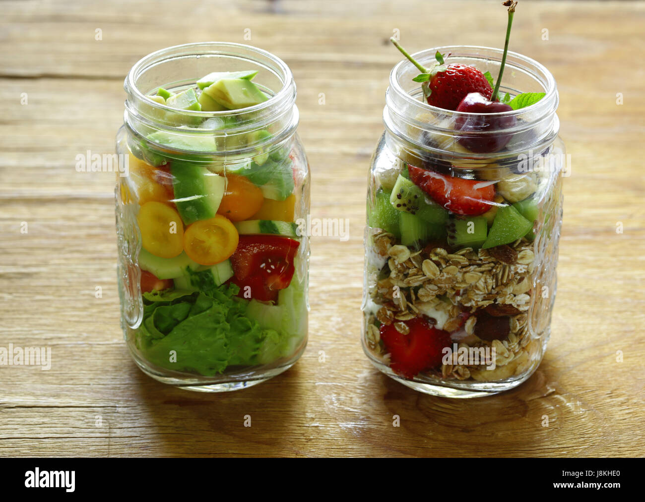 homemade granola and vegetable salad in a glass jars Stock Photo - Alamy