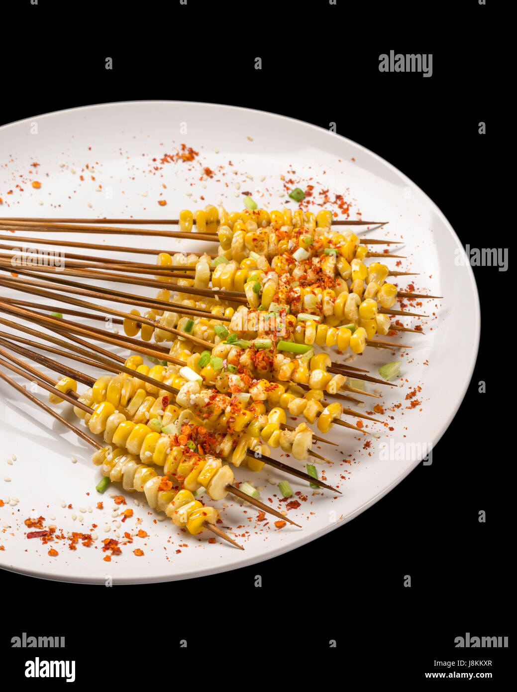 A Plate of Chinese BBQ on Black Background.Corn Stock Photo - Alamy