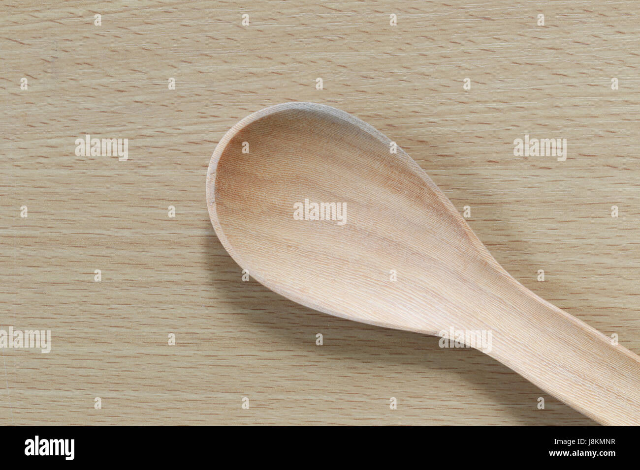Empty wooden spoon on wood floor in food design concept Stock Photo - Alamy