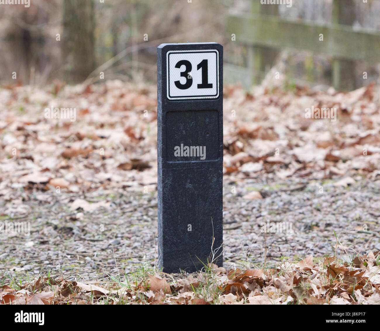 Sign displaying 31, at the side of the road Stock Photo - Alamy