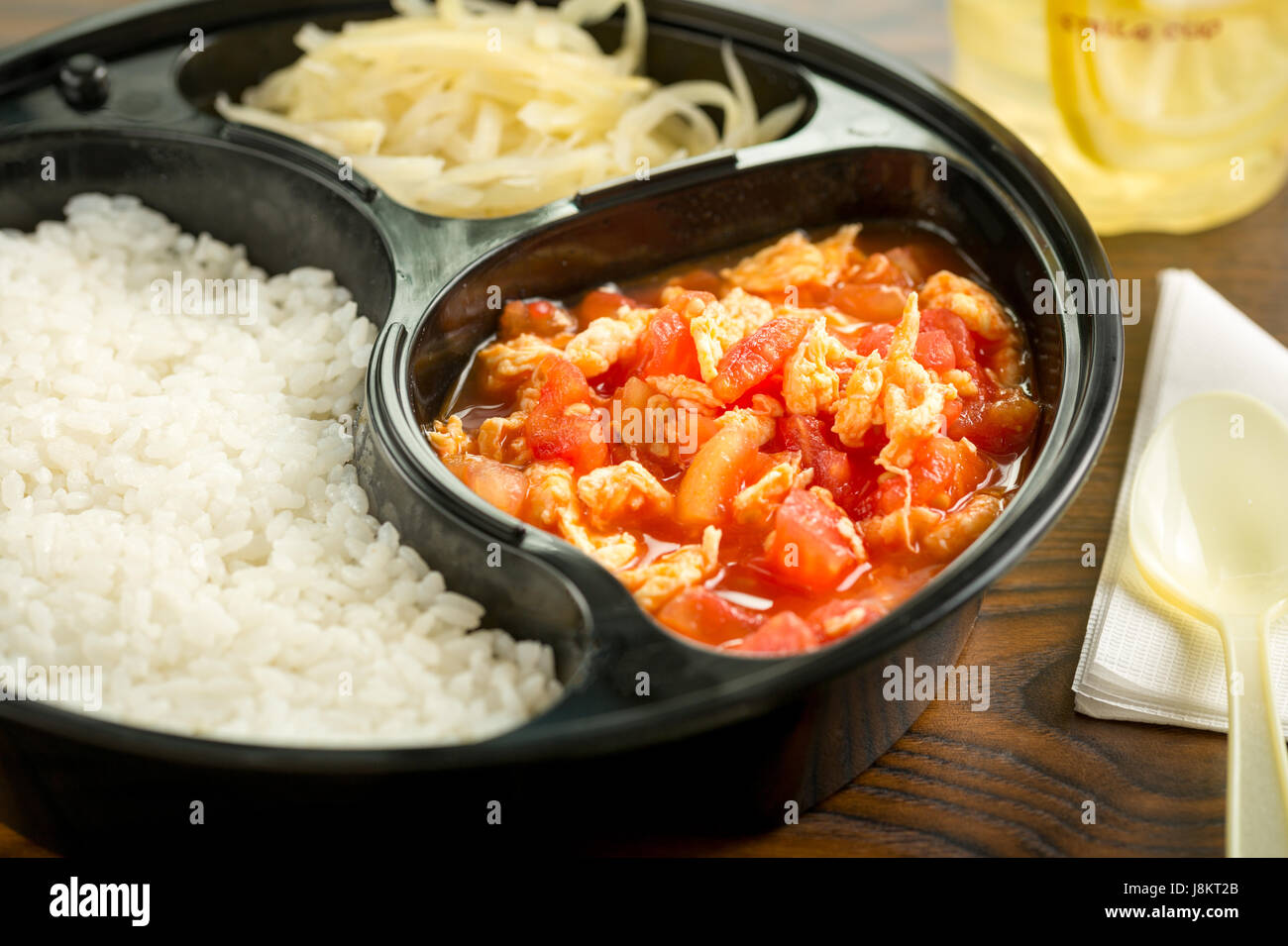 Delicious Chinese Food in a Plastic Bowl on the Table Stock Photo - Alamy