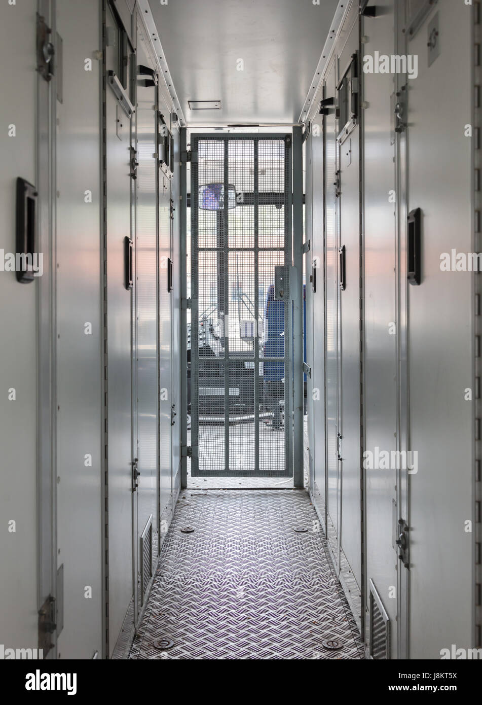 Inside of a large bus used by the department of justice to transport ...