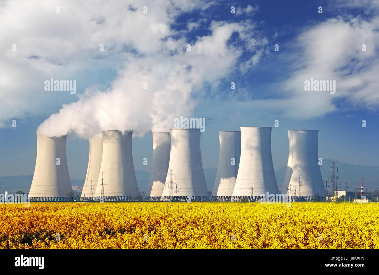 Nuclear power plant with a red field Stock Photo - Alamy