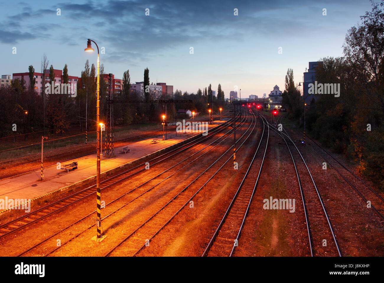 Train railroad at a night with railroad Stock Photo - Alamy