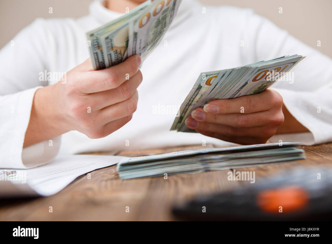 Hands counting money, close up Stock Photo - Alamy
