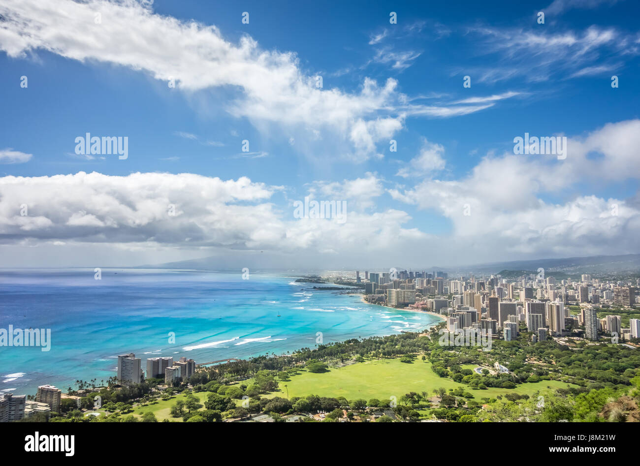 A rainstorm giving way to beautiful blue skies over Honolulu and the ...
