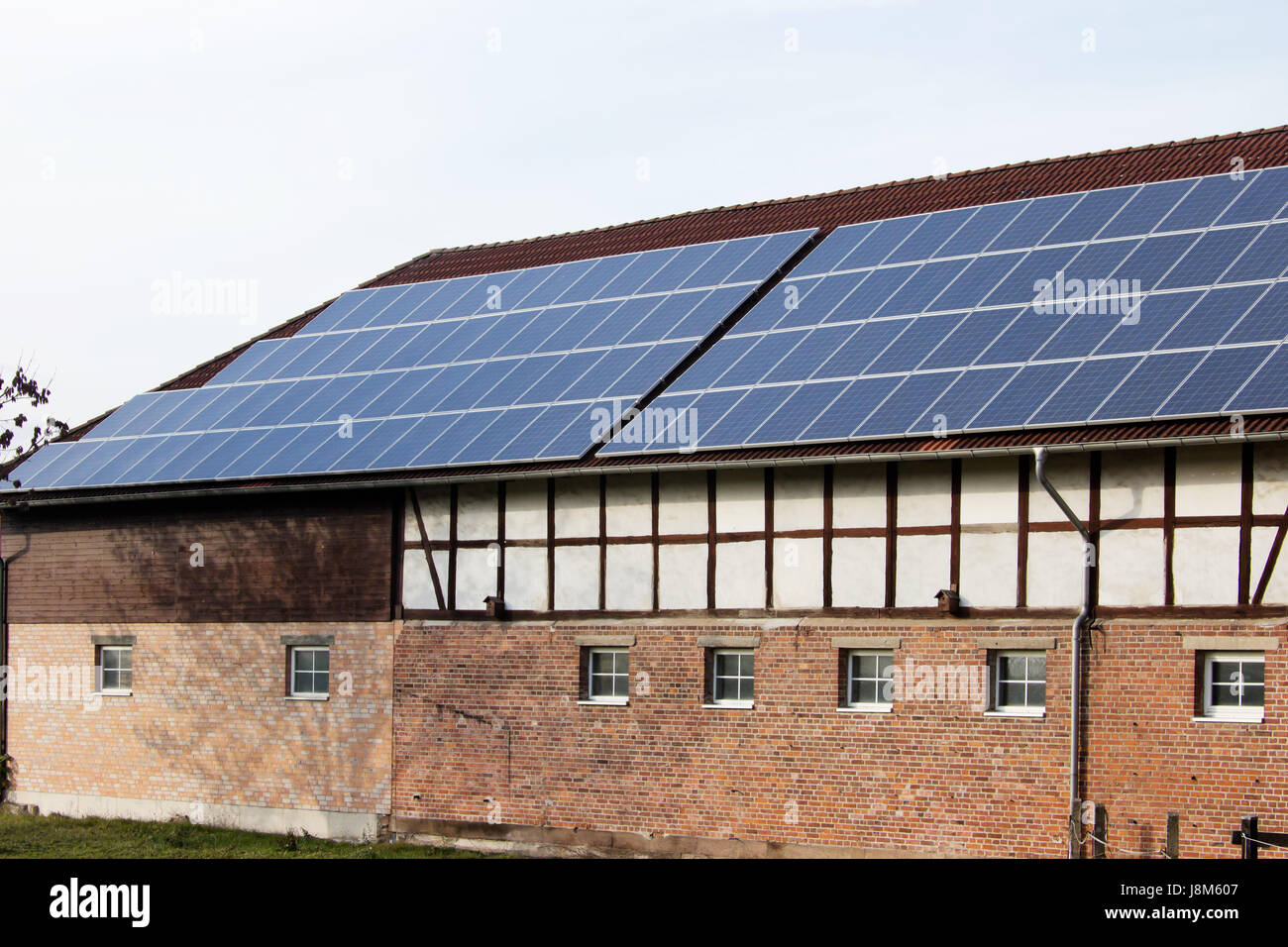 roof with solar panels Stock Photo - Alamy
