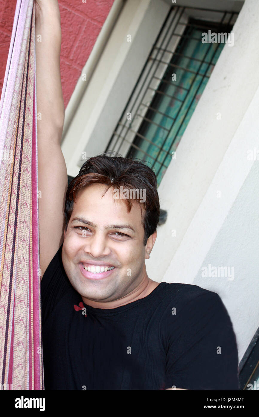 Indian guy laughing hi-res stock photography and images - Alamy