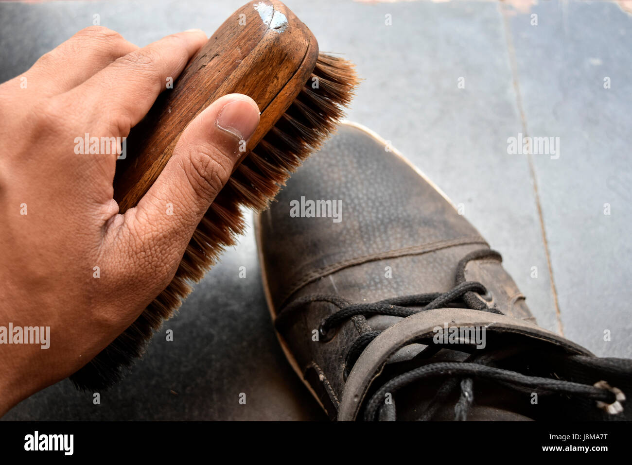 Polishing shoes man hi-res stock photography and images - Alamy