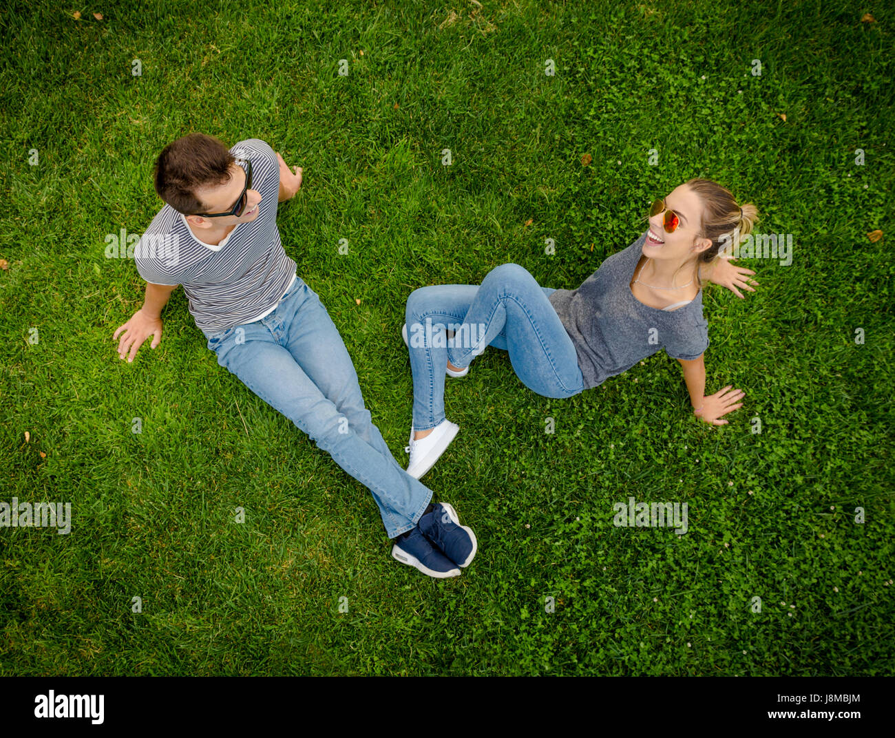 Top view of a happy young couple in the park together Stock Photo - Alamy