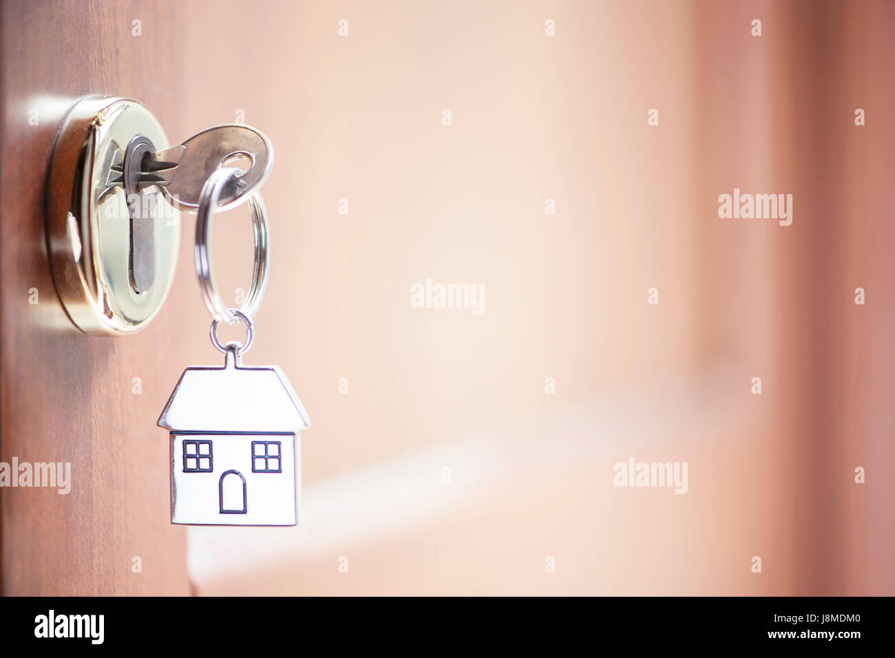 House key in the door Stock Photo - Alamy