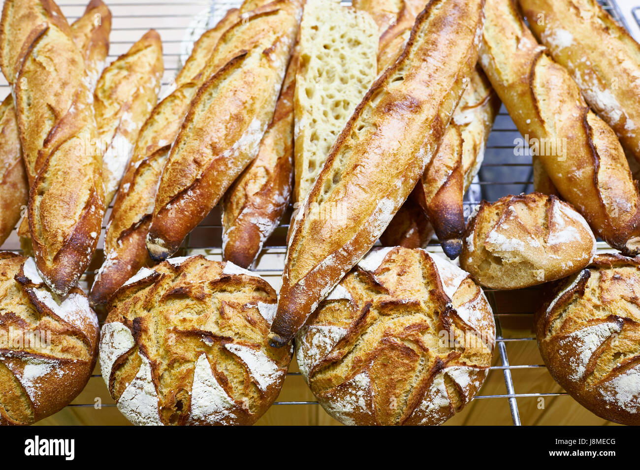Fresh baguette bread in bakery closeup Stock Photo - Alamy