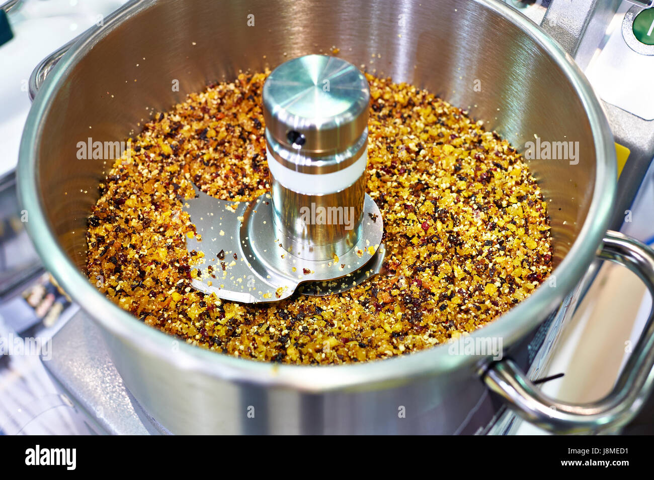 Big blender with nuts close-up Stock Photo - Alamy