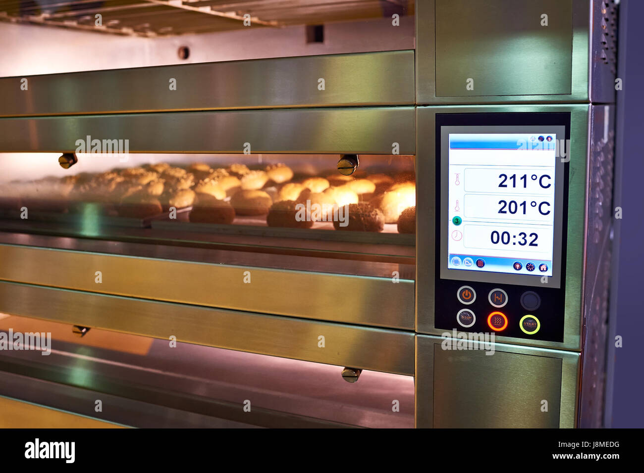 LCD screen of oven with bread in the bakery Stock Photo - Alamy