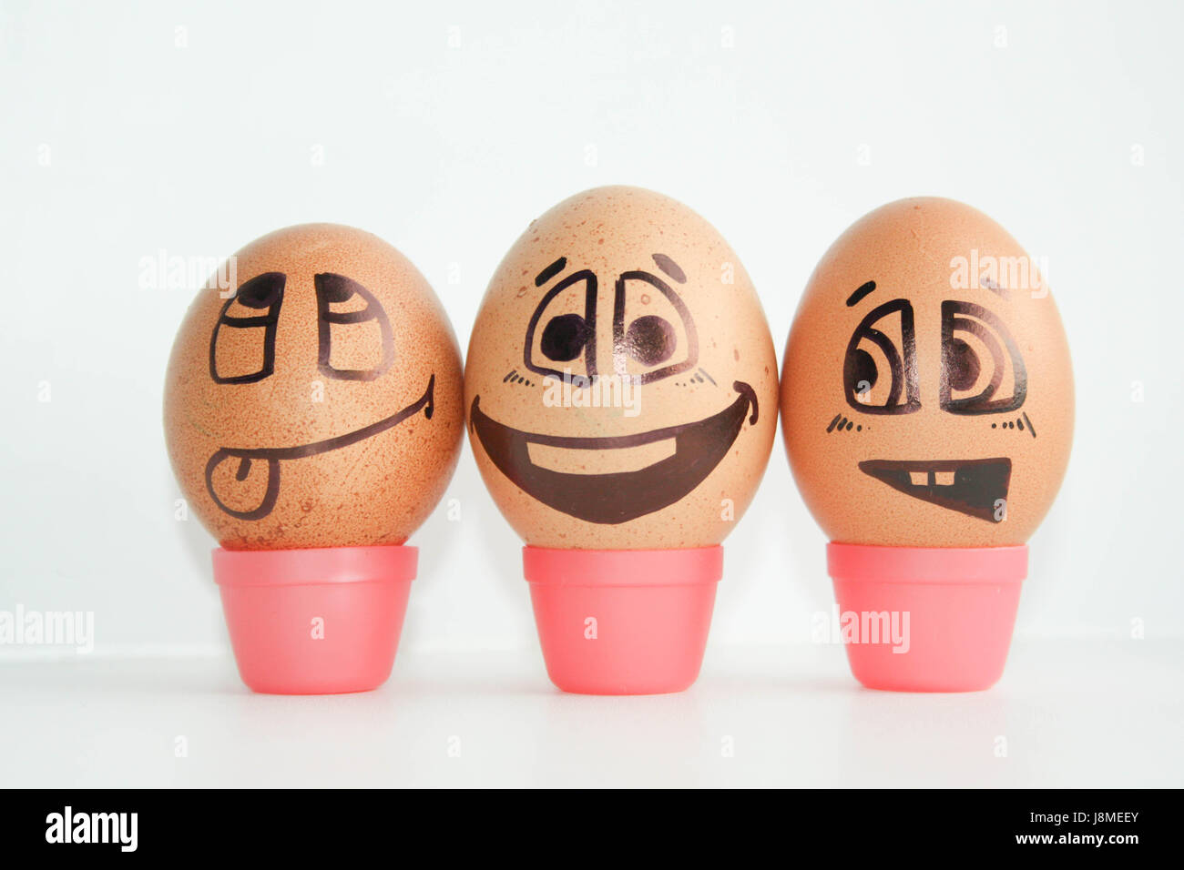 Cheerful eggs three friends, brown eggs. Shows the language and teases ...