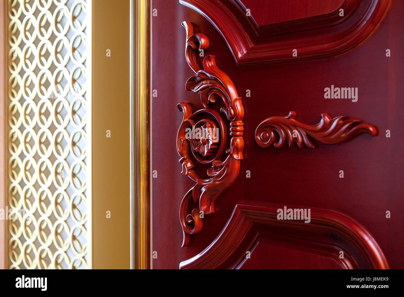 Carved wood texture doors mahogany interior element Stock Photo - Alamy