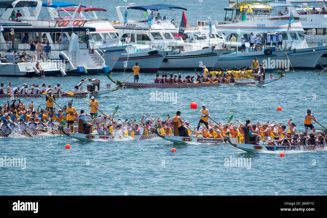 Spectator boats line up by the race start line.Annual International ...