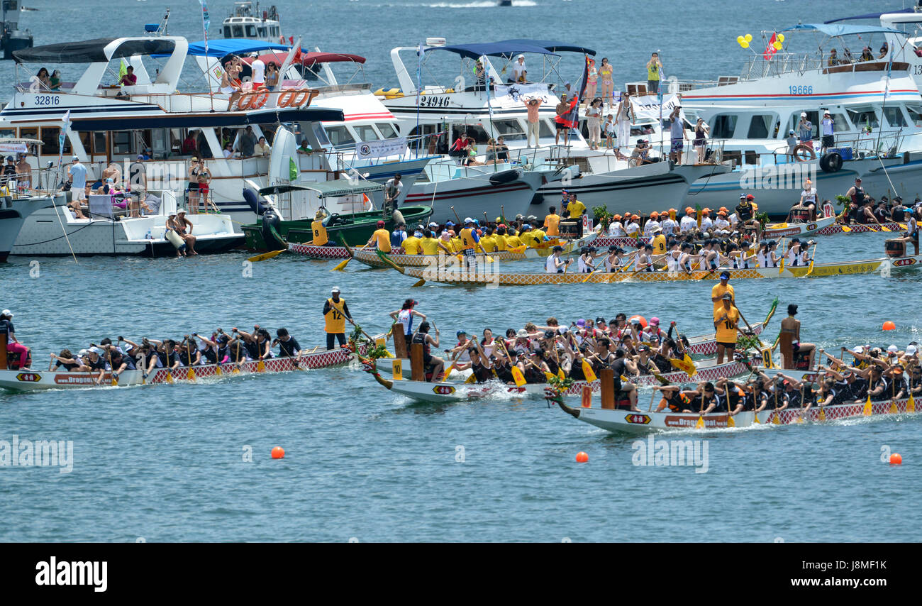 Spectator boats line up by the race start line.Annual International ...