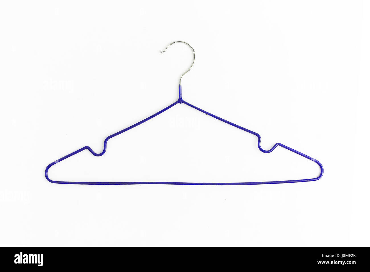 One colored metal hanger, isolated on white background, close-up Stock ...