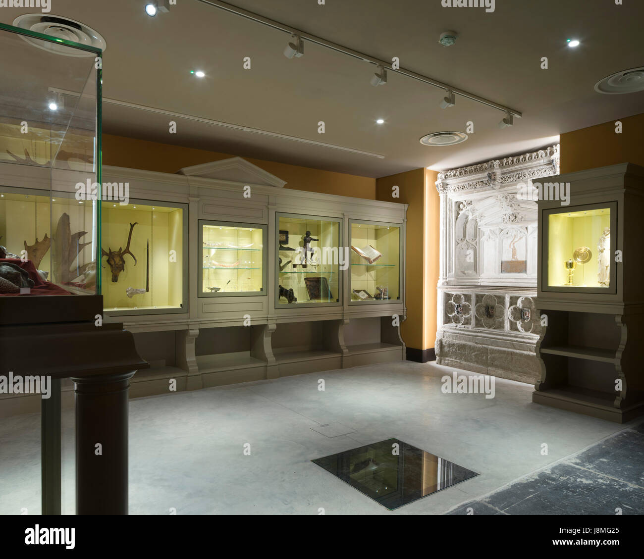 View through exhibition space with illuminated relief. Garden Museum ...