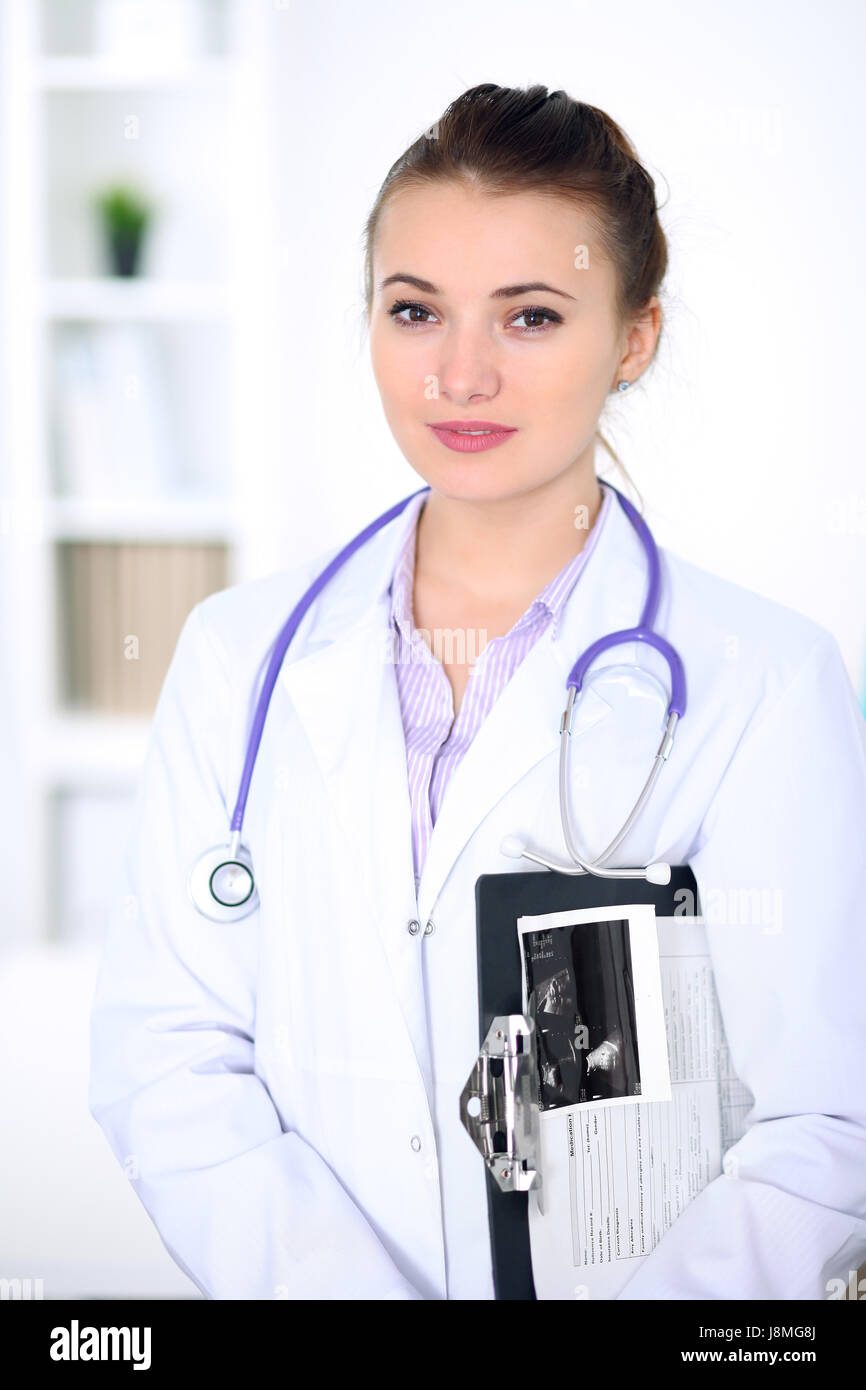 Portrait of young female doctor in a hospital Stock Photo - Alamy